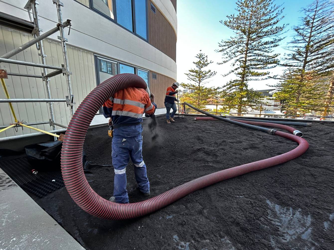 Rooftop Garden Soil Installation for Altum Living | Perth Materials Blowing
